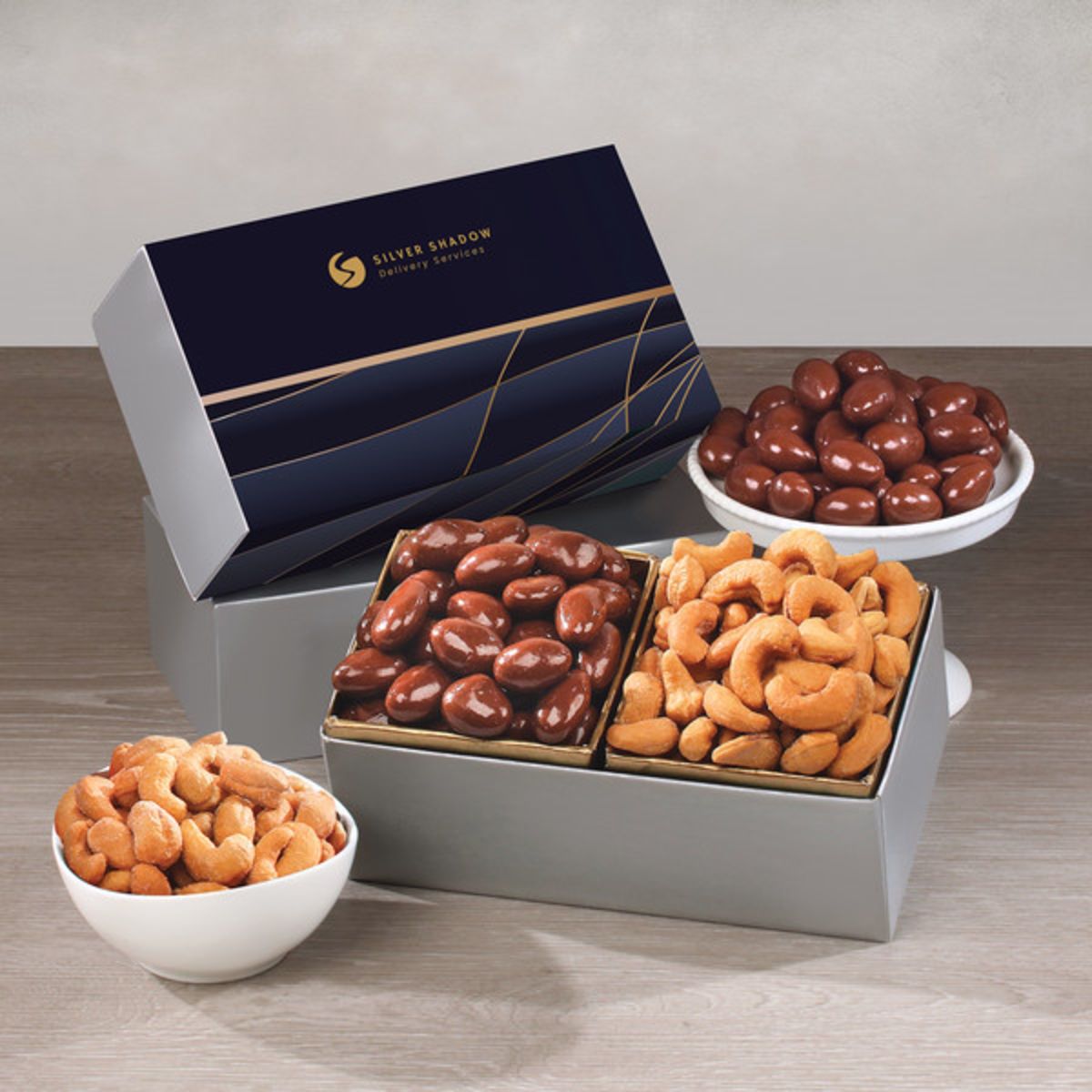Chocolate covered almonds fancy cashews in navy gold gift box | Order Swag